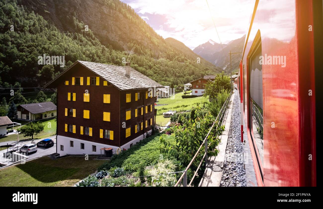 Red train in landscape hi-res stock photography and images - Alamy