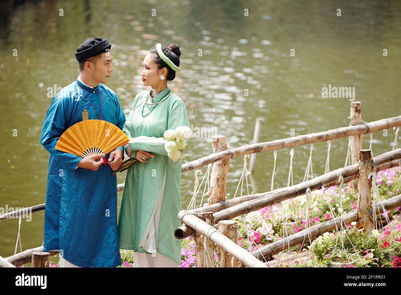 Just married Vietnamese husband and wife in traditional dresses ...