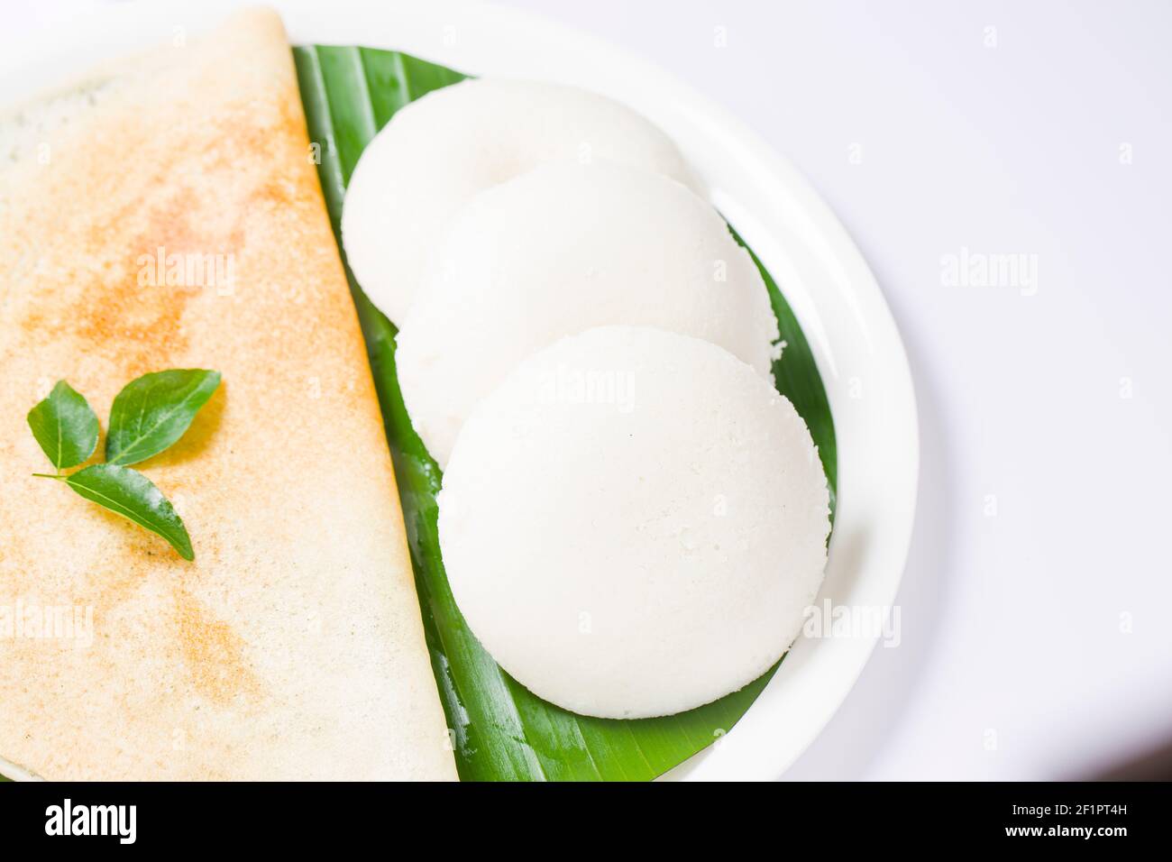 Ghee roast Dosa and Idlii, south indian main breakfast item which is ...