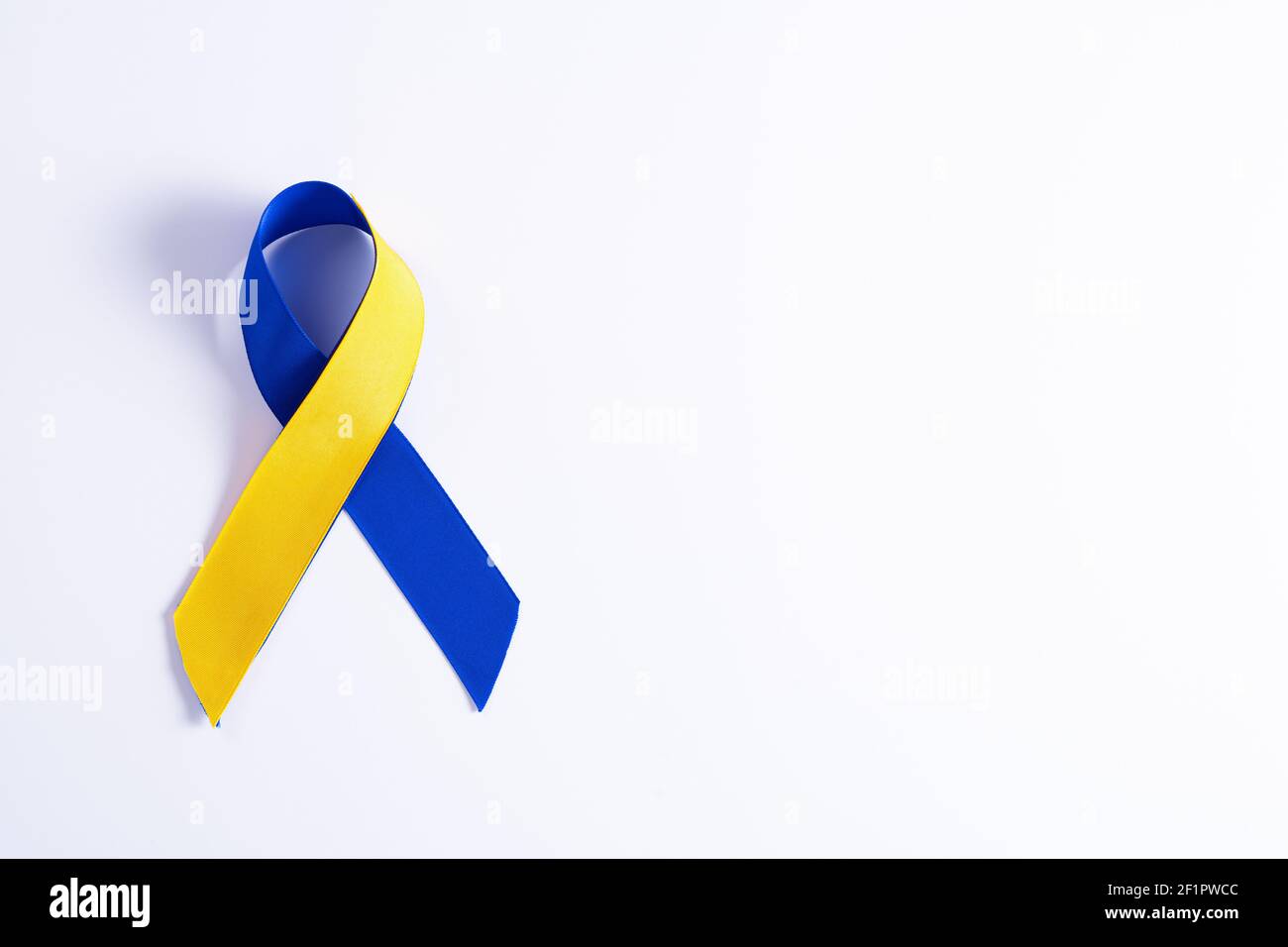 Down syndrome day with blue yellow ribbon awareness support patient ...