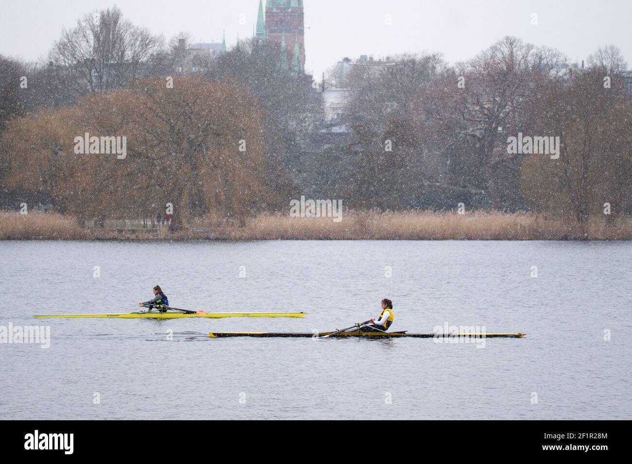 Hamburg, Germany. 09th Mar, 2021. Two female rowers are sailing in a ...