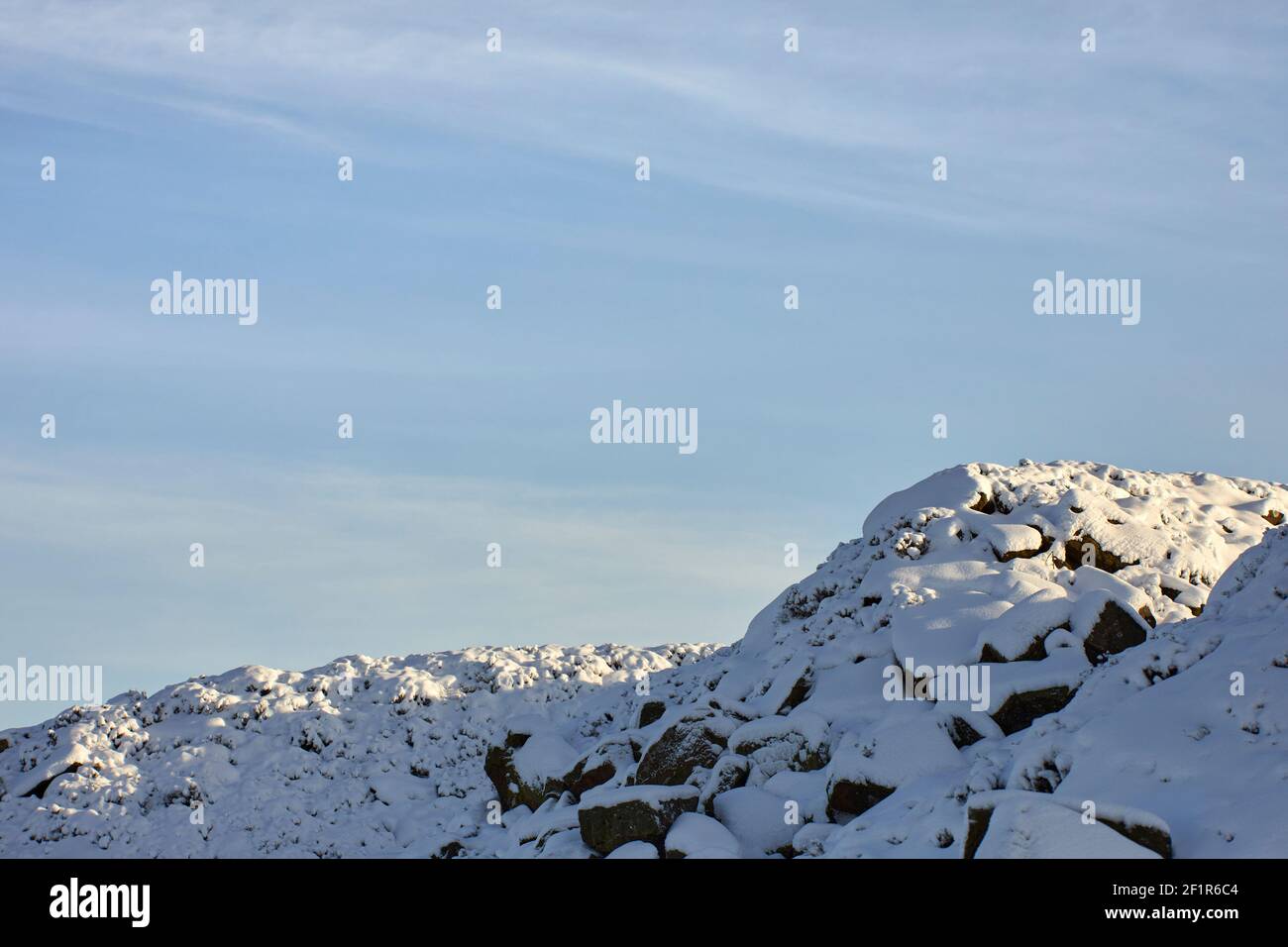 Snow covers the abandoned quarry spoil heap at 900ft Stock Photo - Alamy