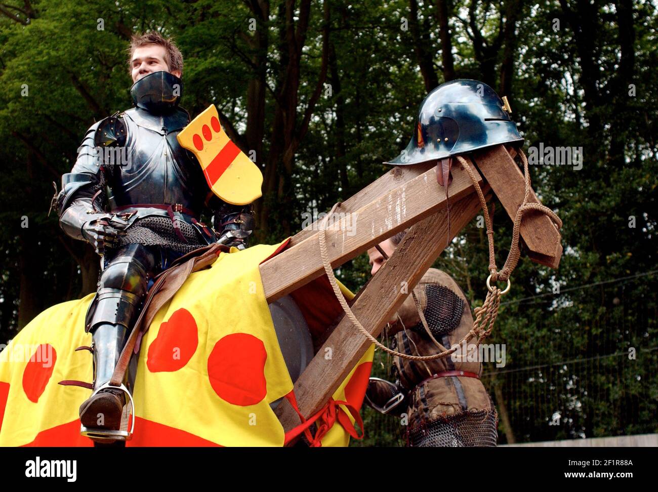 OLLIE DUFF IS PUT THROUGH HIS PACES AS A KNIGHT IN SWORDSMANSHIP AND ...