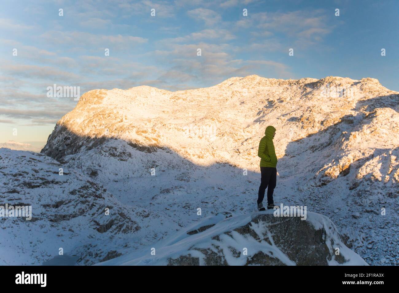 Man standing on rocky summit hi-res stock photography and images - Alamy