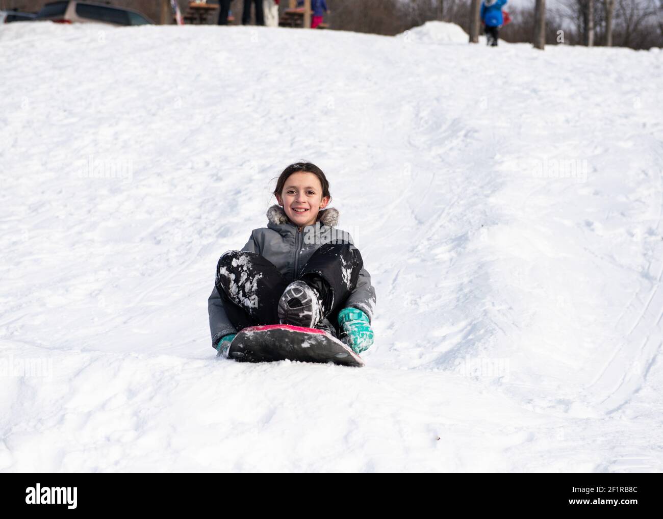 Sledding down hill hi-res stock photography and images - Alamy