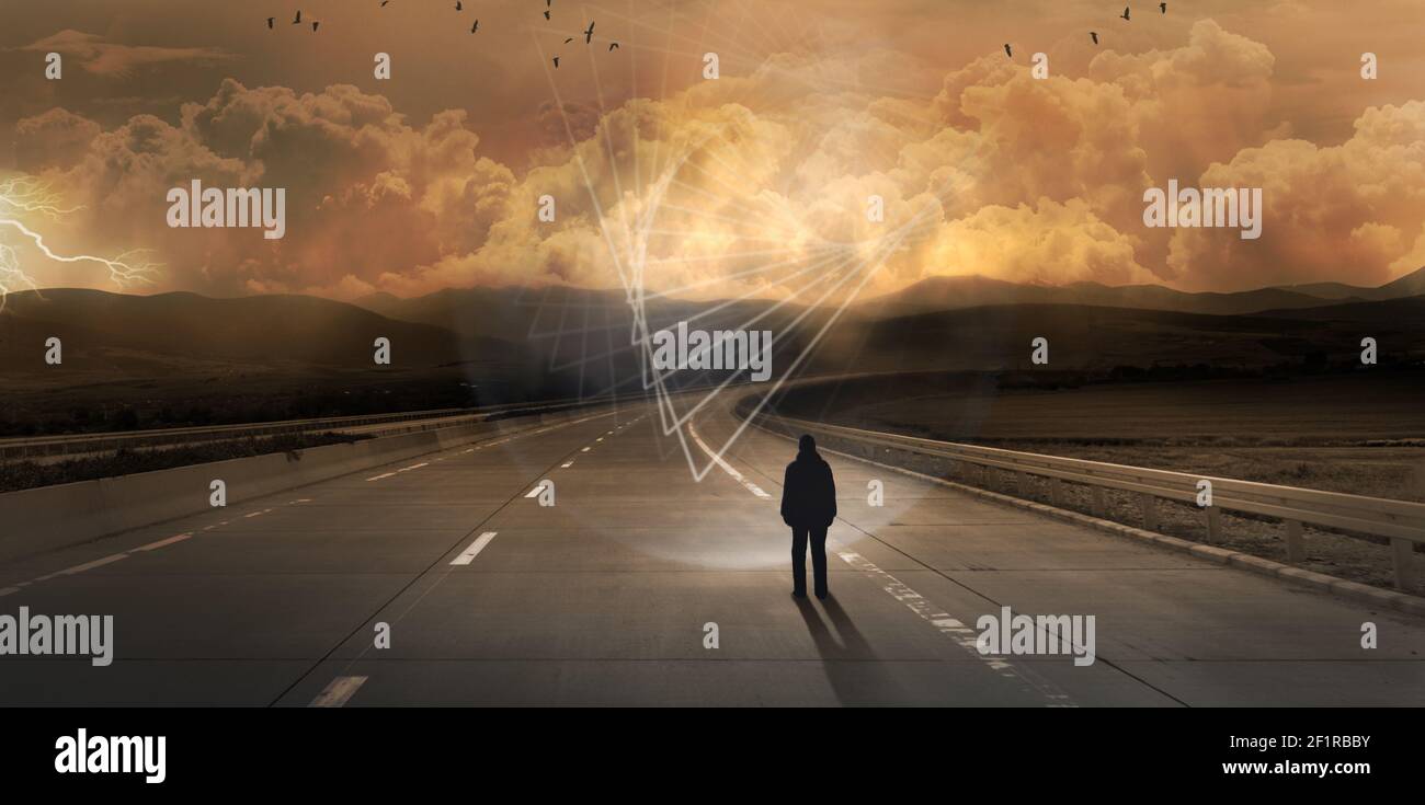 silhouette of a man on the road, concept of uncertainty and obscurity ...