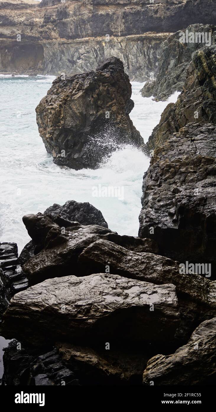 big rocks in surge of Atlantic ocean in Ajuy Fuerteventura Stock Photo ...
