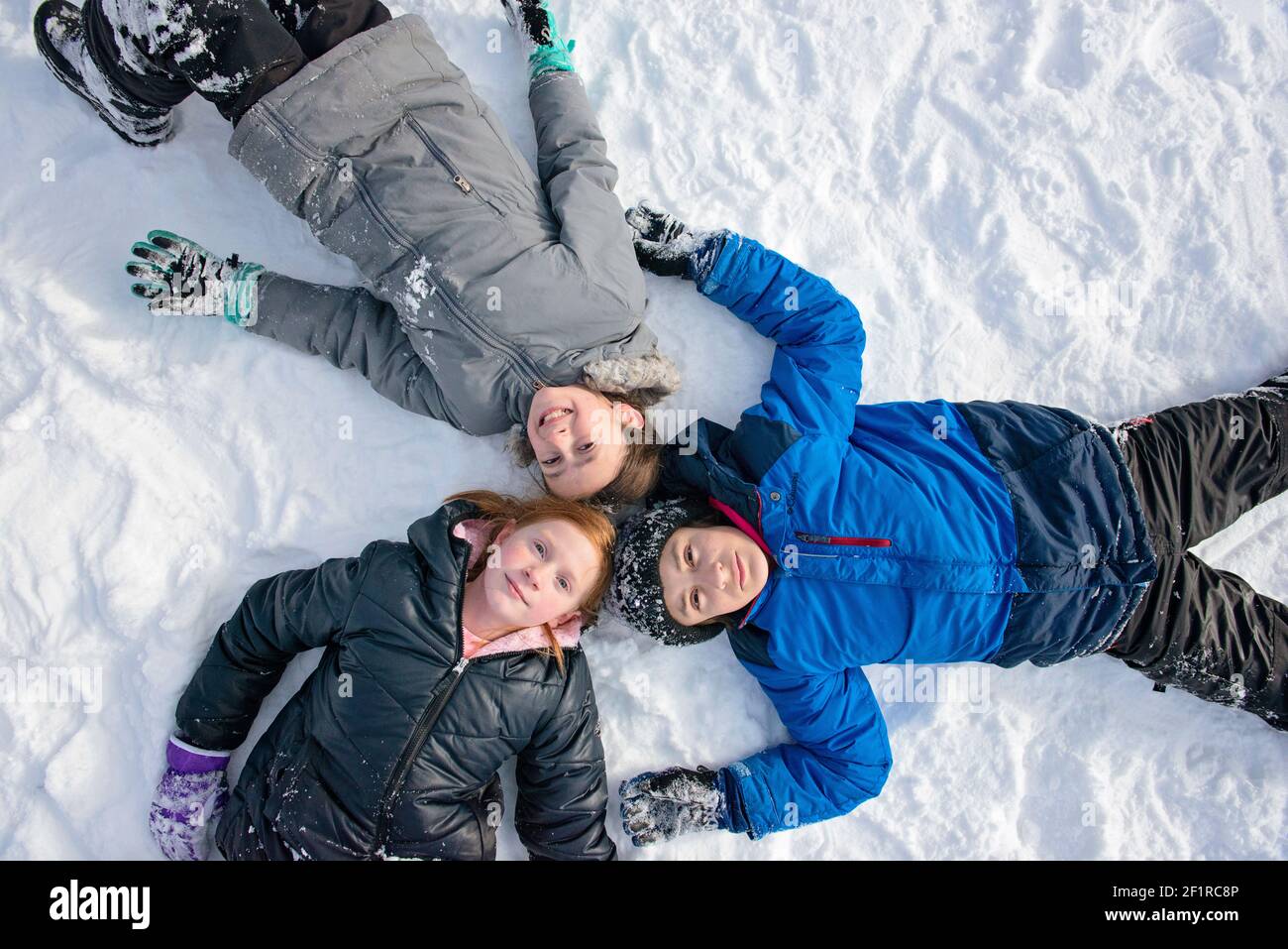 Kids playing on ice hi-res stock photography and images - Alamy