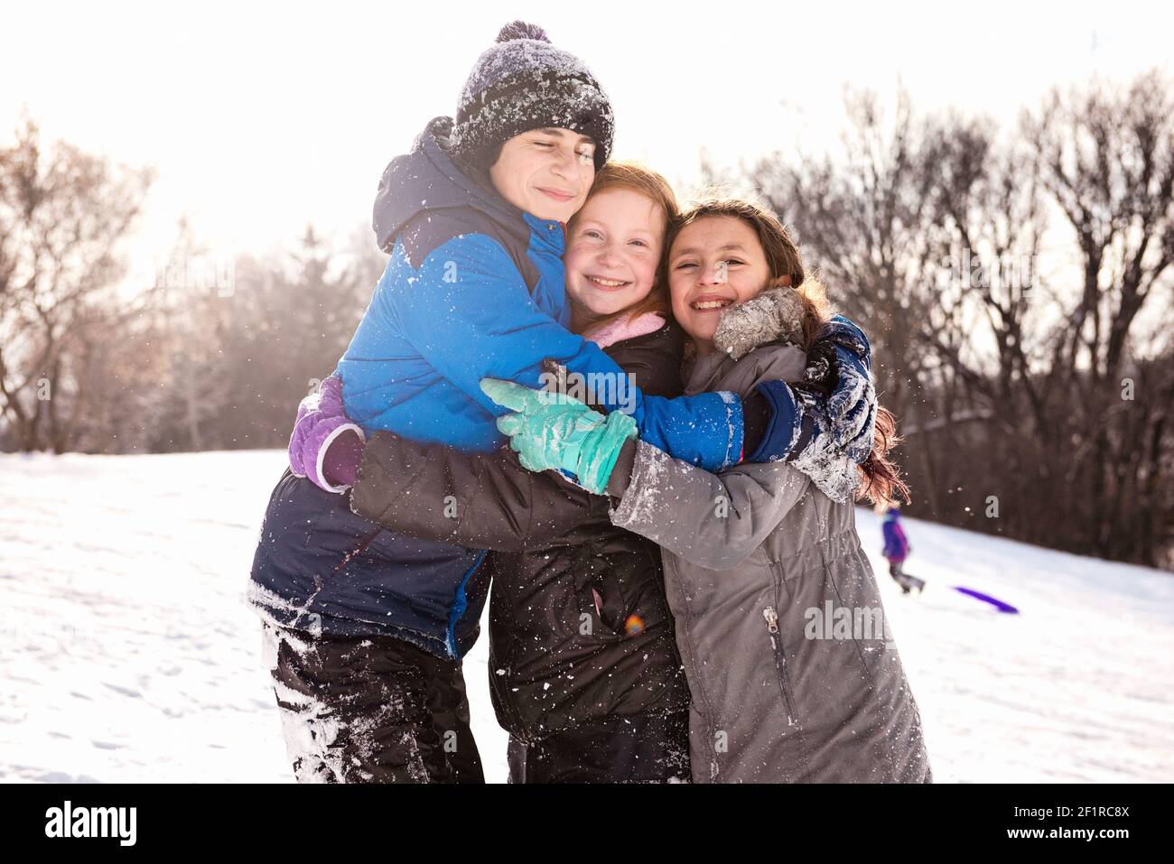Kids hugging hi-res stock photography and images - Alamy