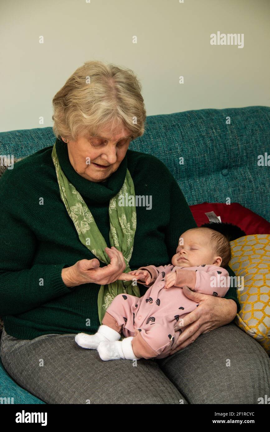 Great Grandmother with new-born great grand-daughter Stock Photo - Alamy
