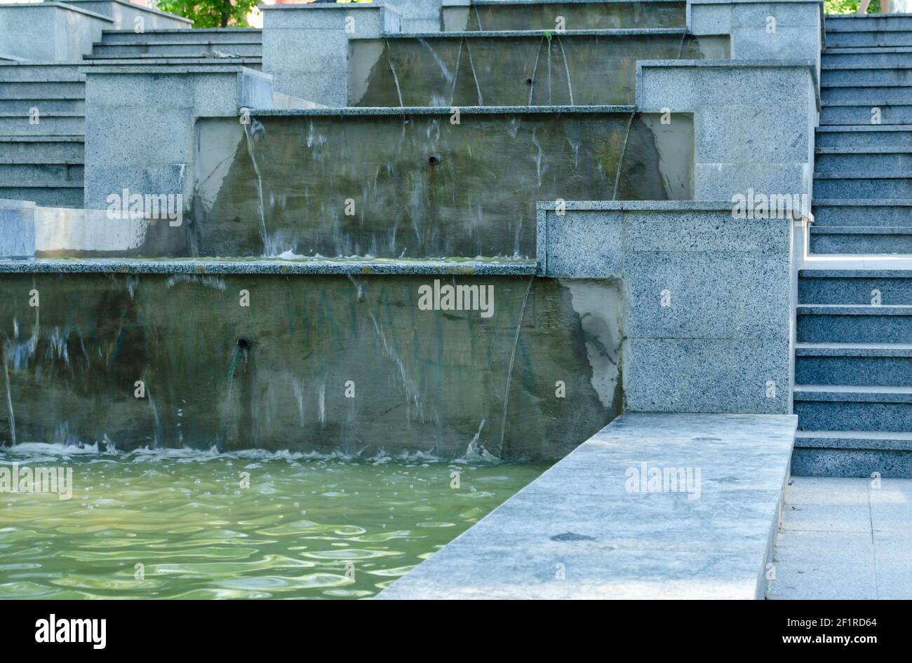 Marble terraces with a waterfall. Thresholds made of marble on which ...