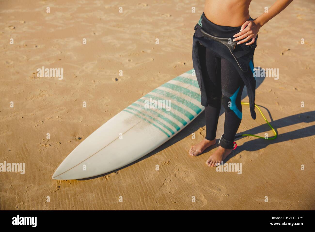 Girl and surfboard hi-res stock photography and images - Alamy