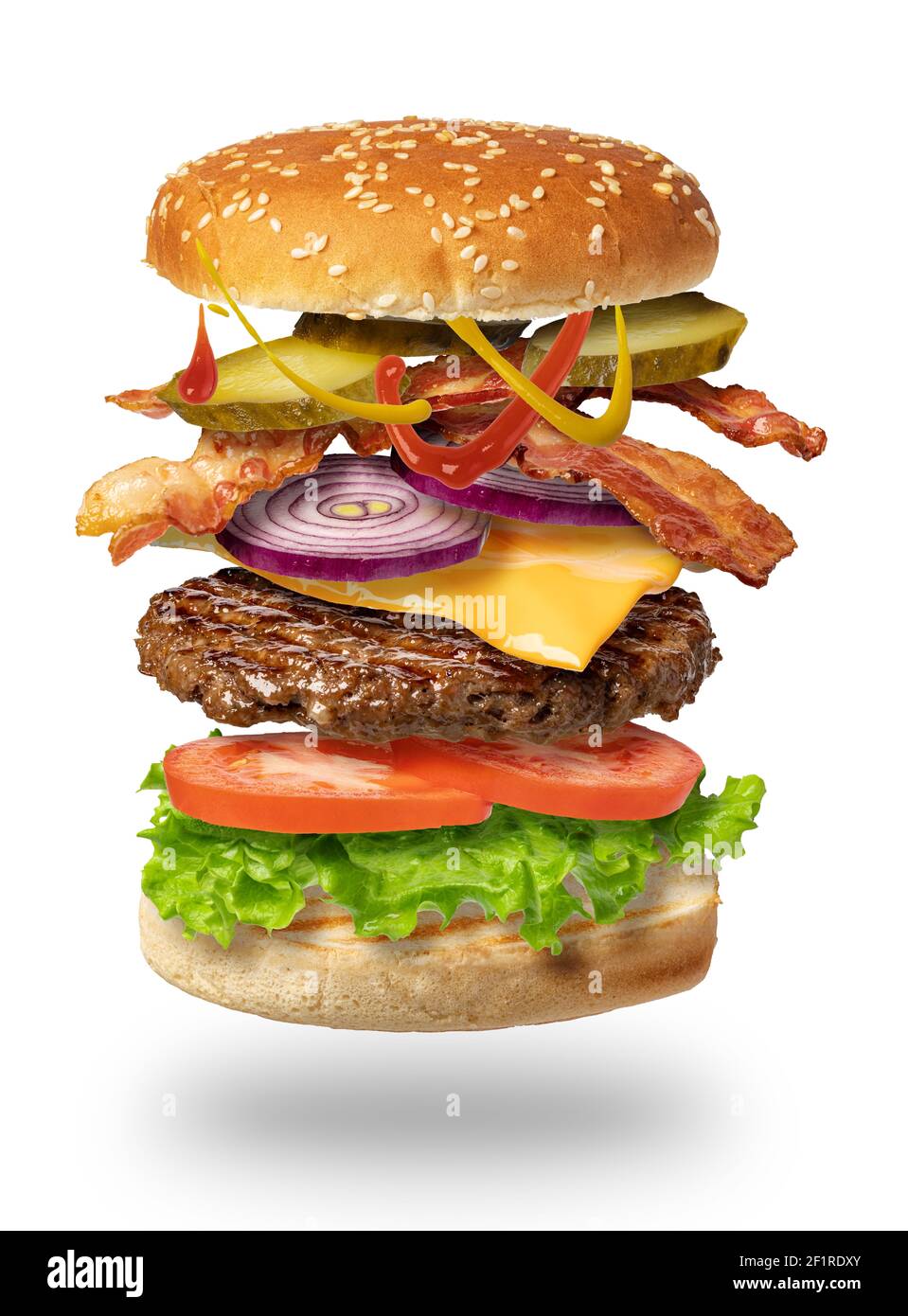 Flying burger on a white background Stock Photo - Alamy