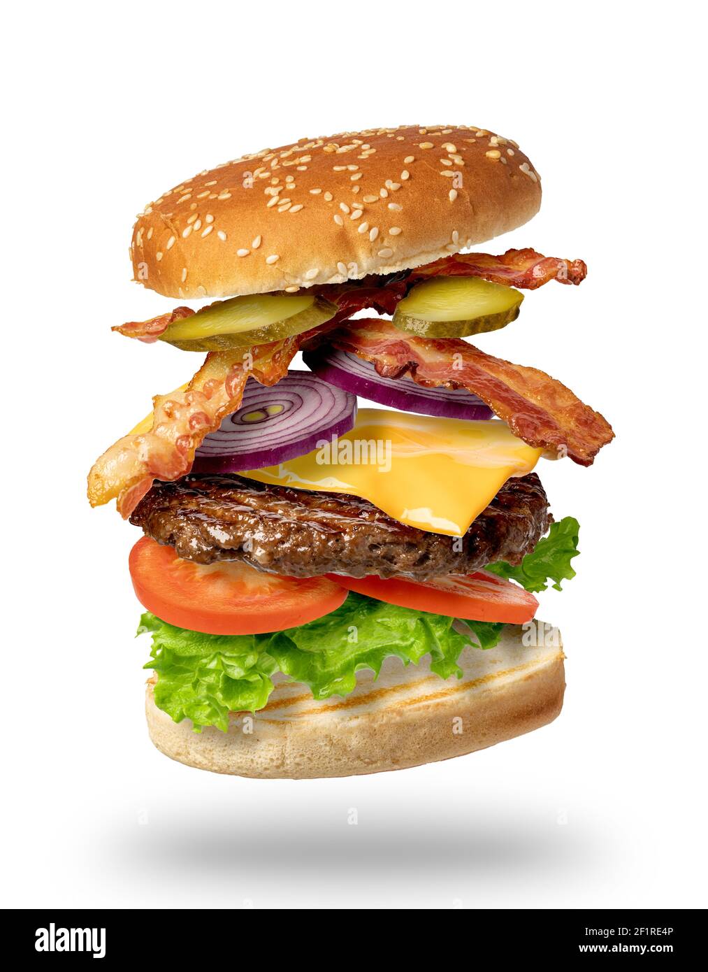 Flying burger on a white background Stock Photo - Alamy