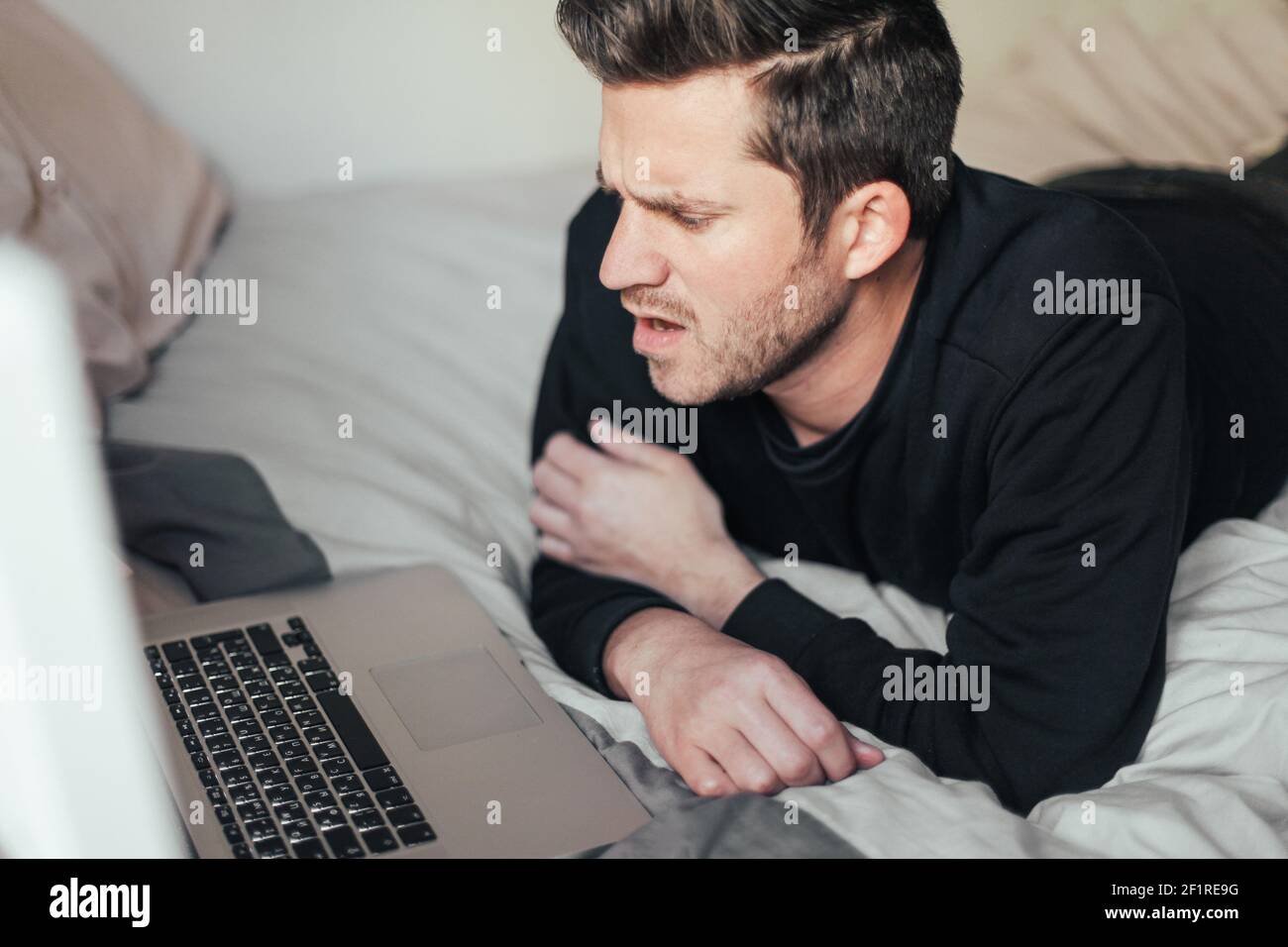 Man disappointed bed hi-res stock photography and images - Alamy