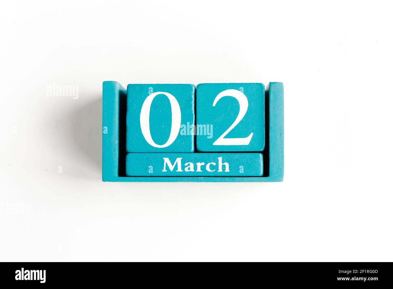 March 2. Blue cube calendar with month date isolated on white ...