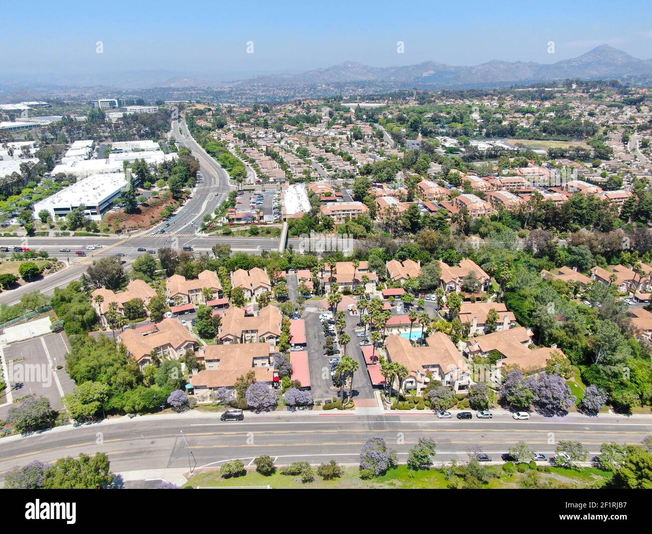 Aerial view middle class neighborhood with condo community and ...