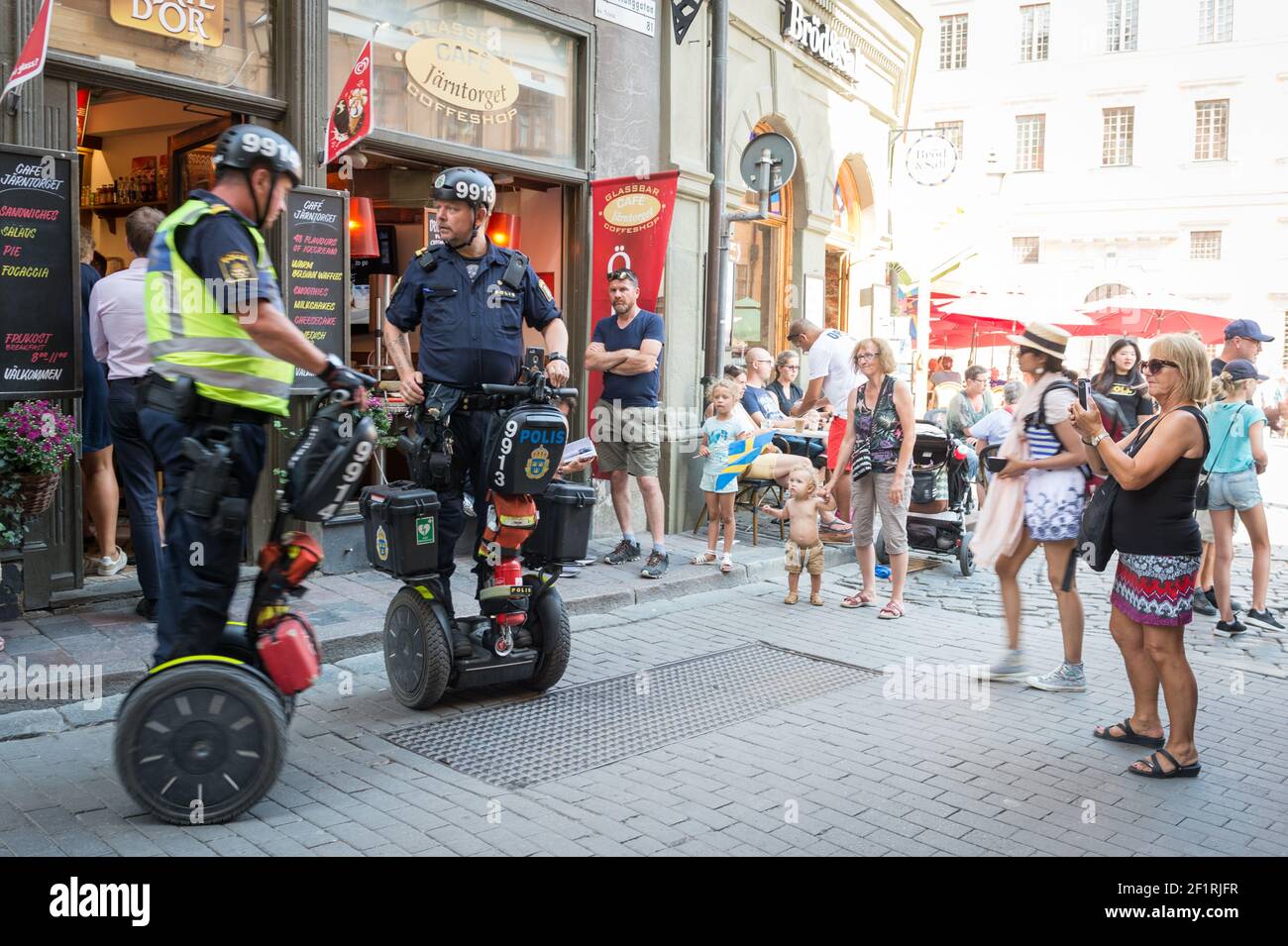 Police on Segways, Västerlånggatan, Gamla Stan, Stockholm, Sweden Stock ...