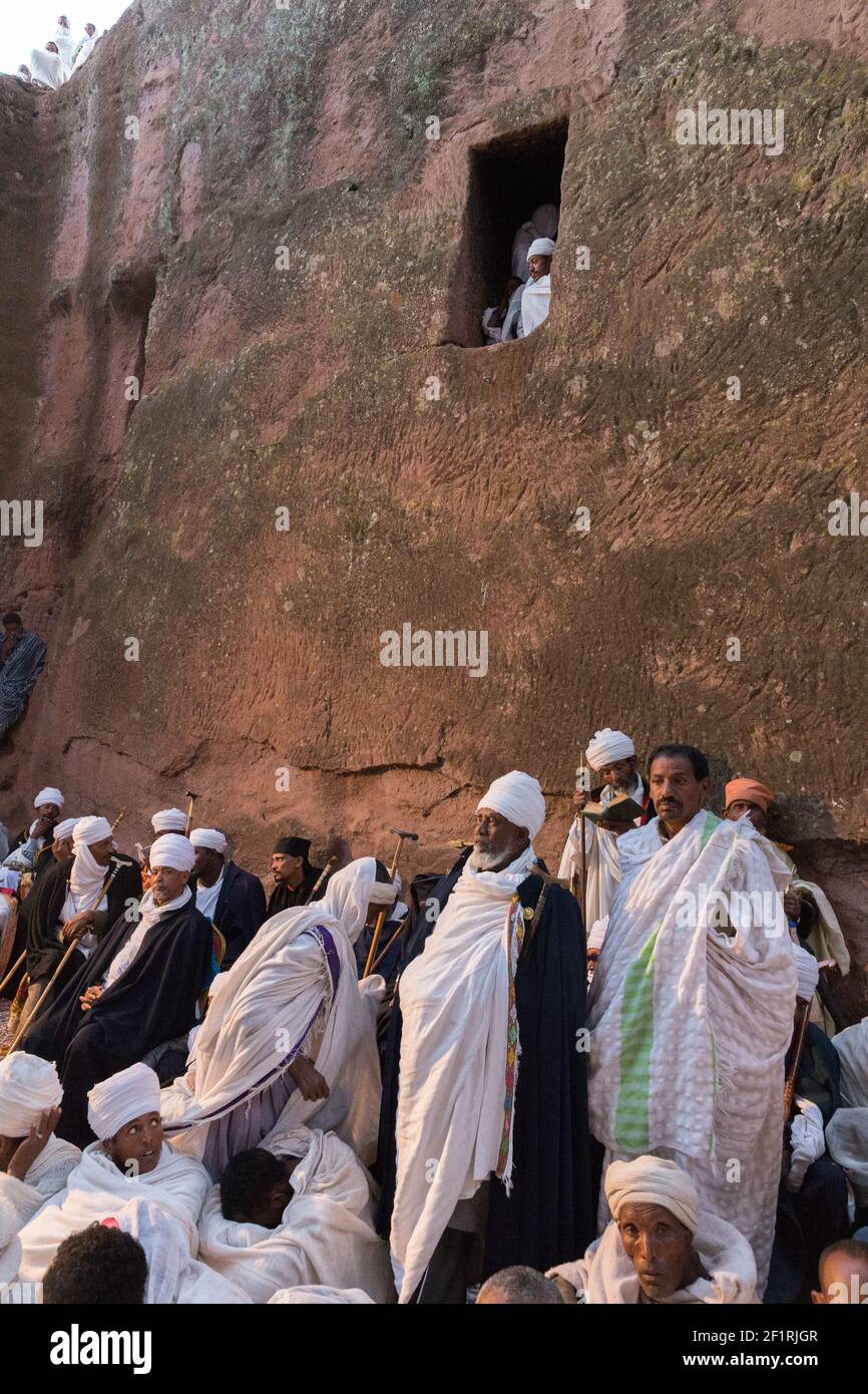 Pilgrims watch the crowds below at St. Emmanuel Church during Gena, the ...