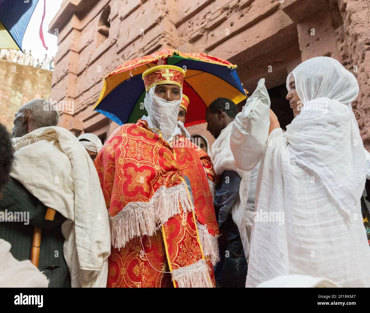 Deacon in a small procession at St. Emmanuel Church during Gena, the ...