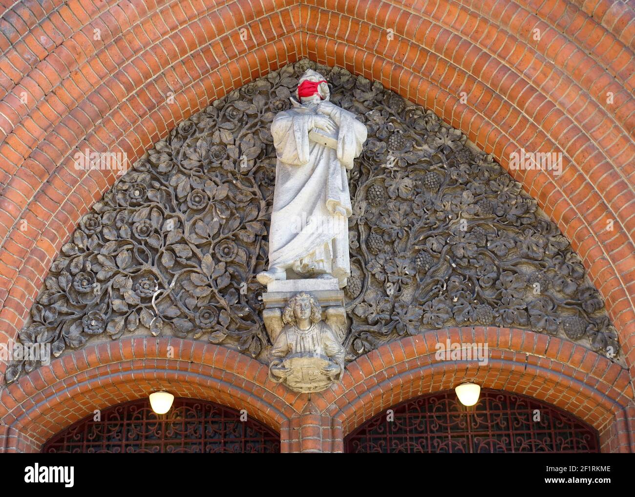 Statue of Martin Luther with face mask, Reformation Church, Berlin ...