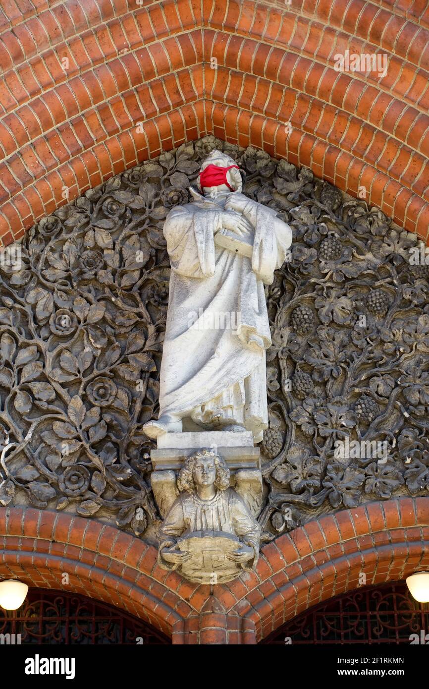 Statue of Martin Luther with face mask, Reformation Church, Berlin ...