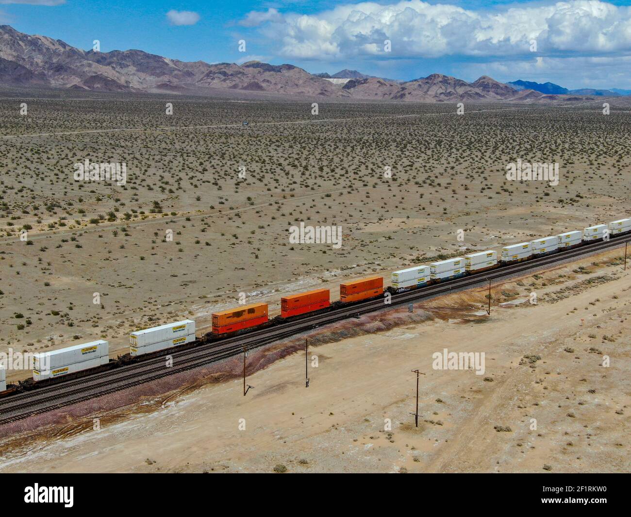 Cargo locomotive railroad engine crossing Arizona desert wilderness ...