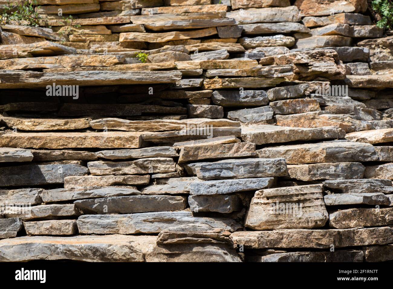 A rocky brick wall texture background under the sunlight Stock Photo ...