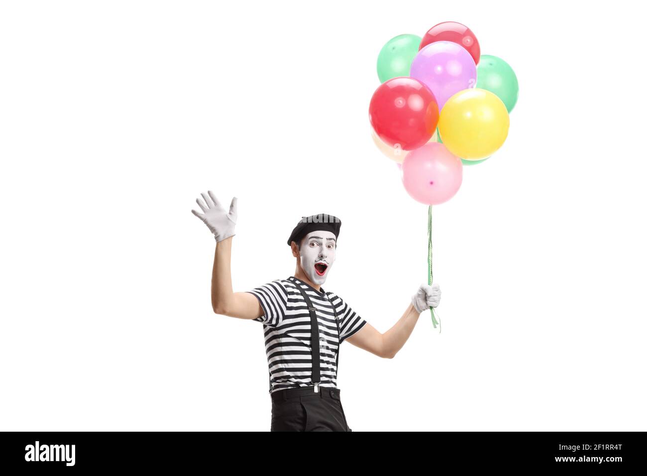 Mime holding a bunch of colorful balloons and waving at the camera ...