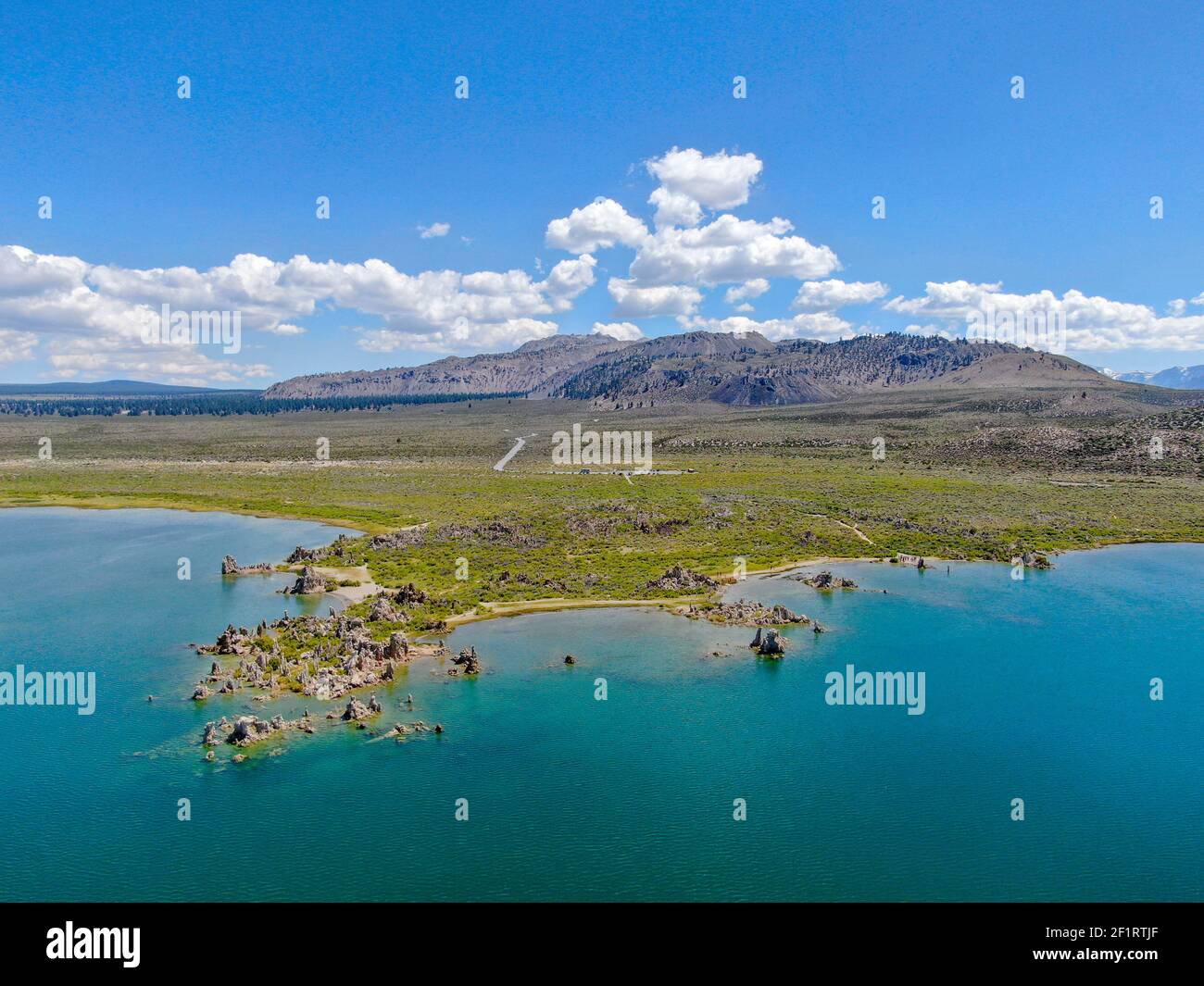Aerial view of Mono Lake with tufa rock formations during summer season ...
