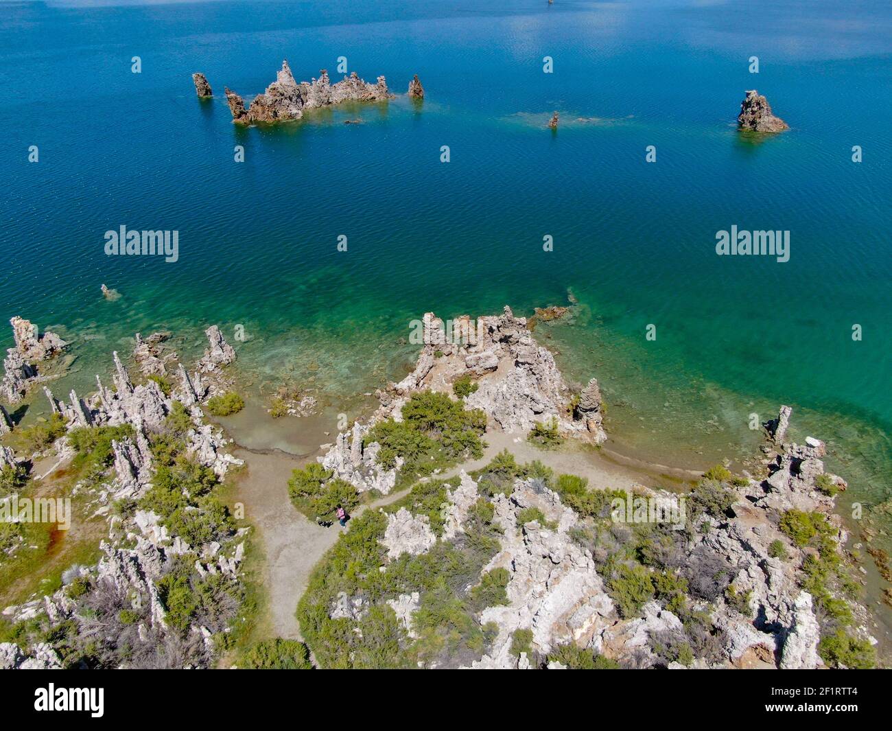 Aerial view of Mono Lake with tufa rock formations during summer season ...