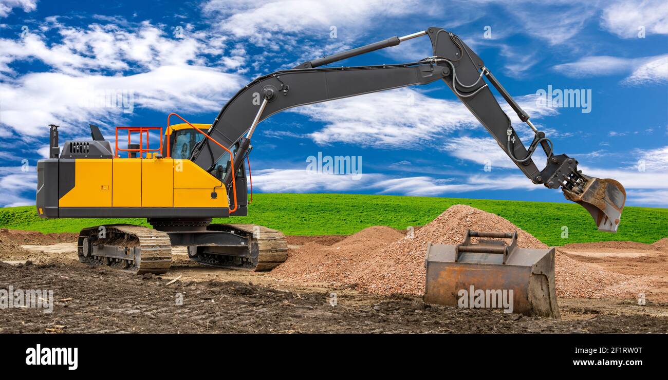 excavator at work on construction site Stock Photo - Alamy