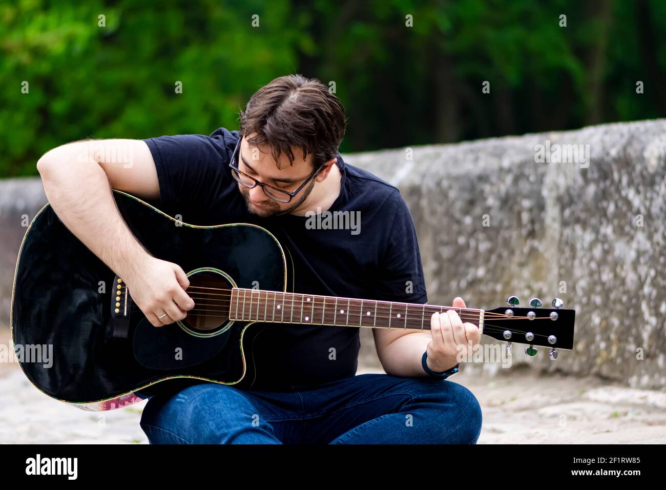 Old man young playing bridge hi-res stock photography and images - Alamy