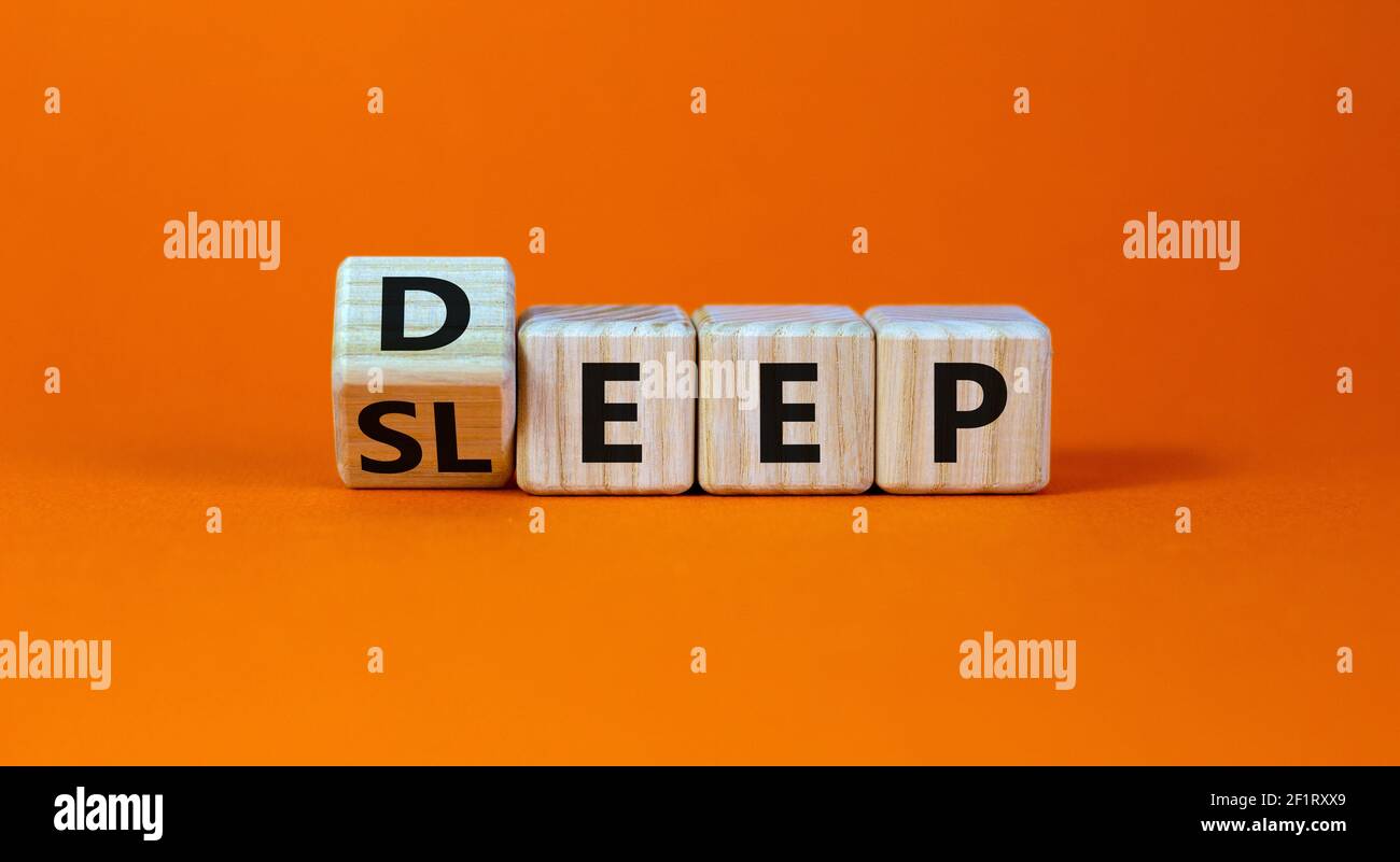 Sleep deep symbol. Turned a wooden cube with words sleep deep ...