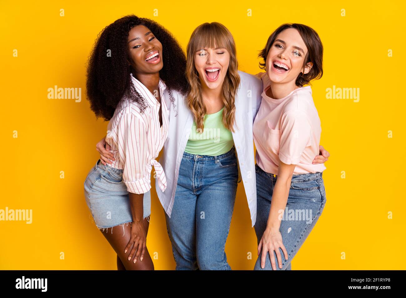 Photo of three cheerful crazy persons dark skin hug toothy smile have ...
