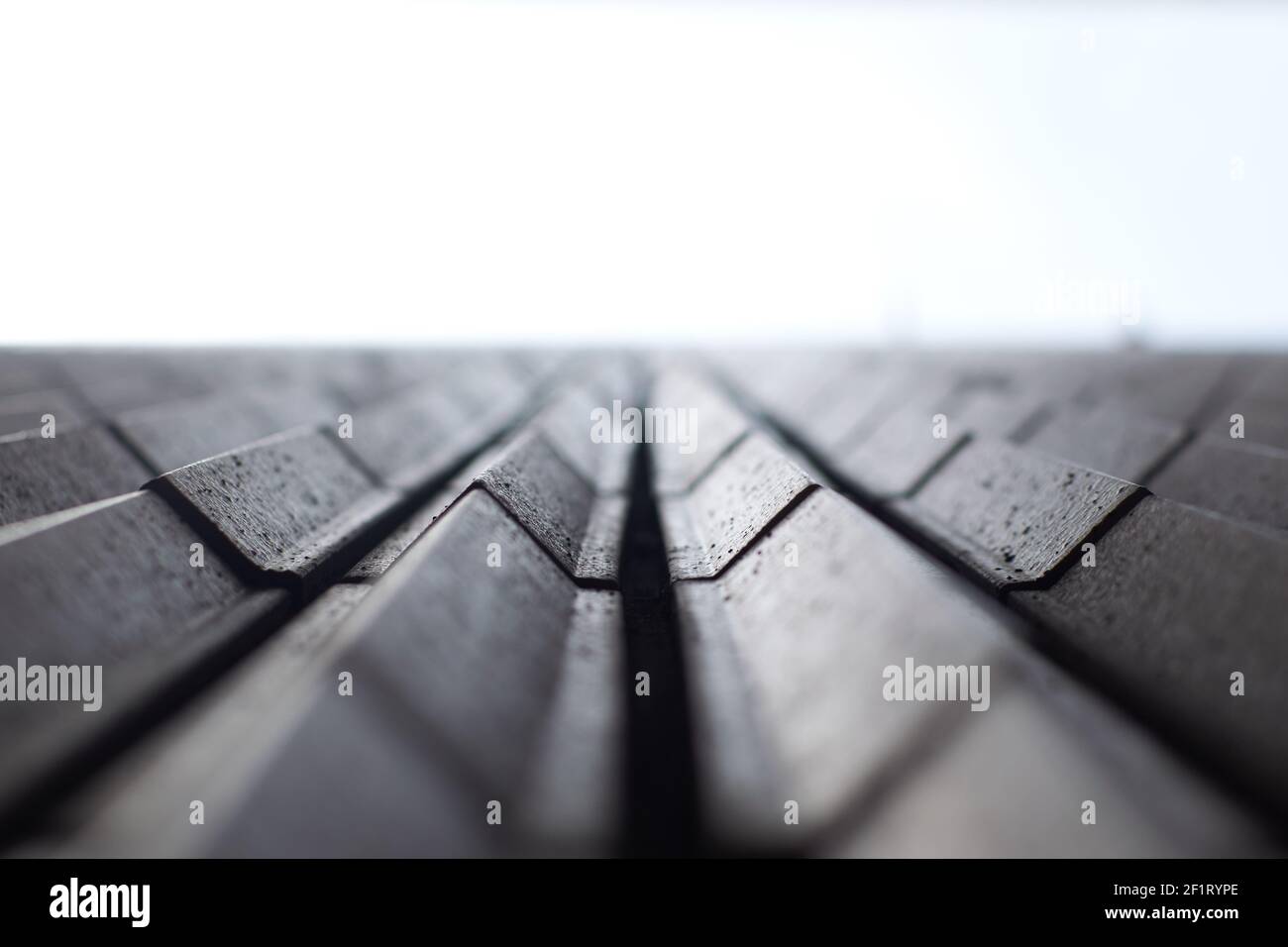 Abstract shot of a concrete wall with sharp lines, edges and short area ...