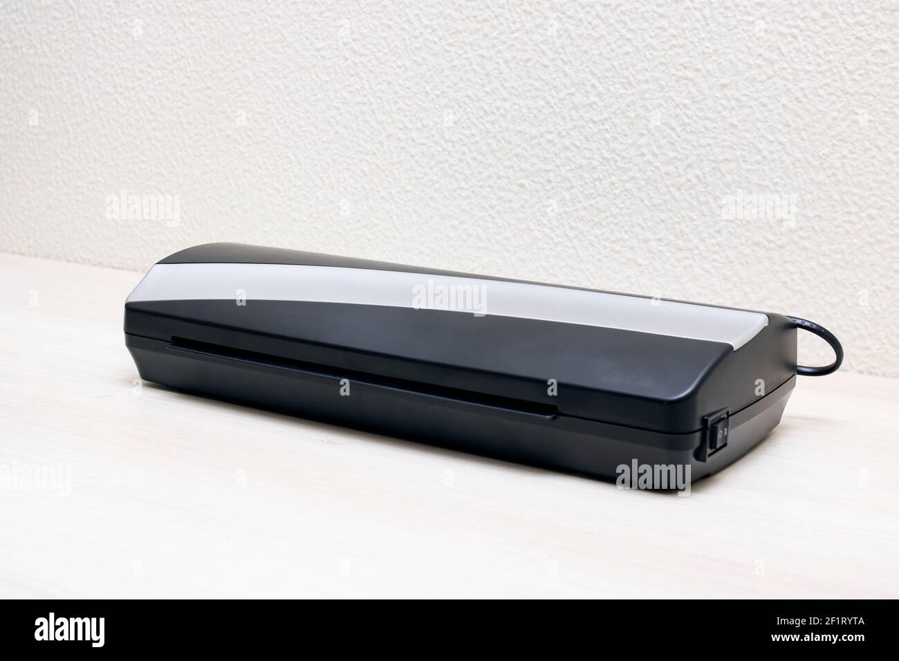 Film lamination machine hi-res stock photography and images - Alamy