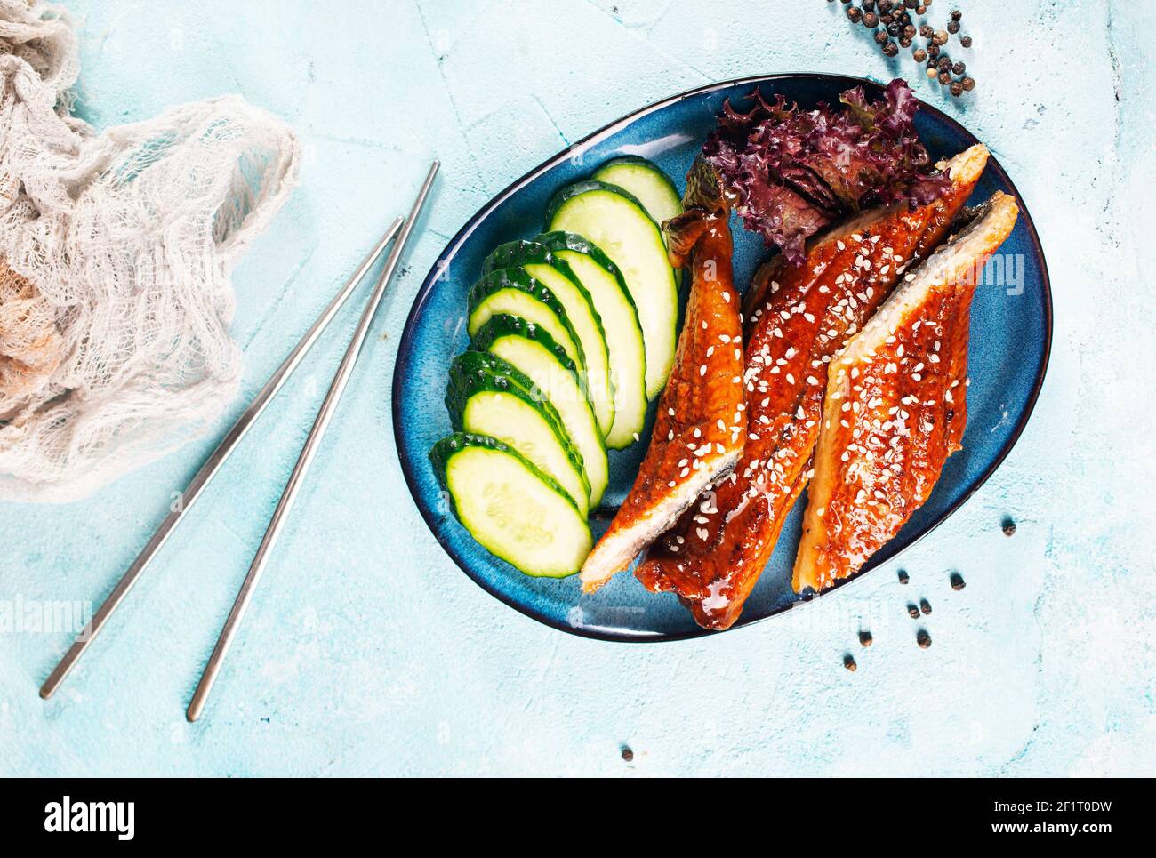 Fried unagi eel with sauce sesame and rice close-up Stock Photo - Alamy