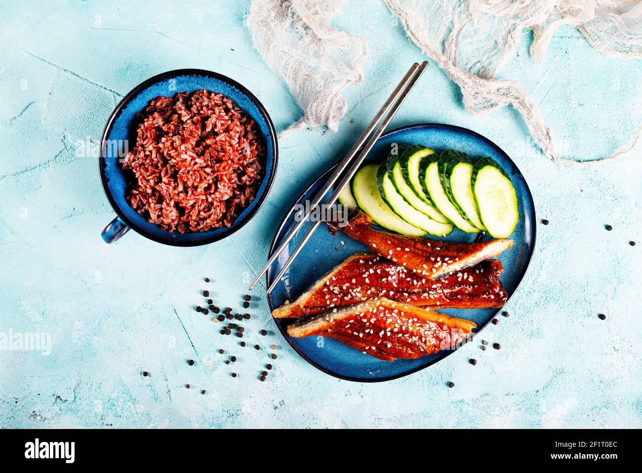 Fried unagi eel with sauce sesame and rice close-up Stock Photo - Alamy