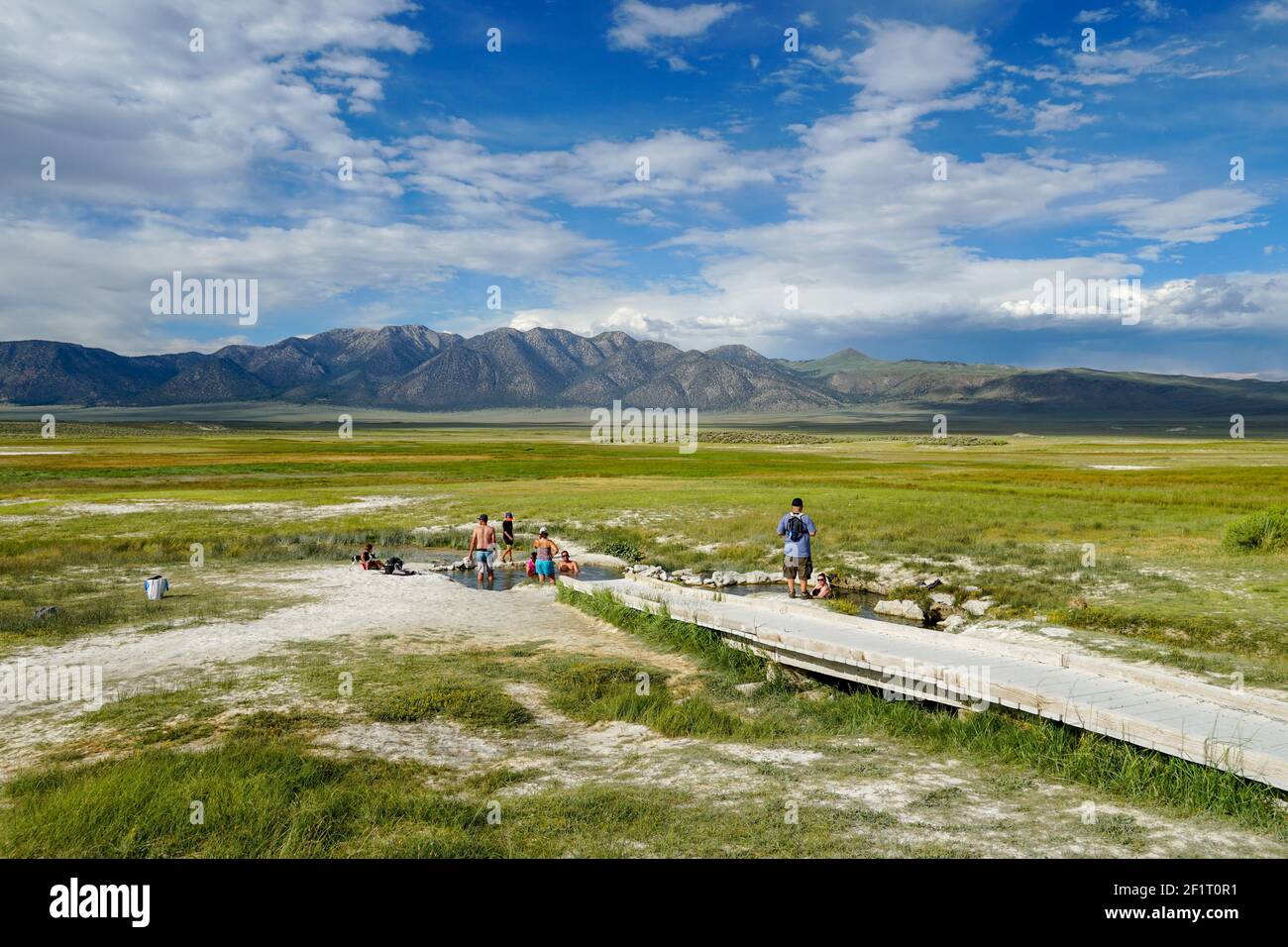 Families and kids enjoying Wild Willy's Hot Spring in Long Valley ...