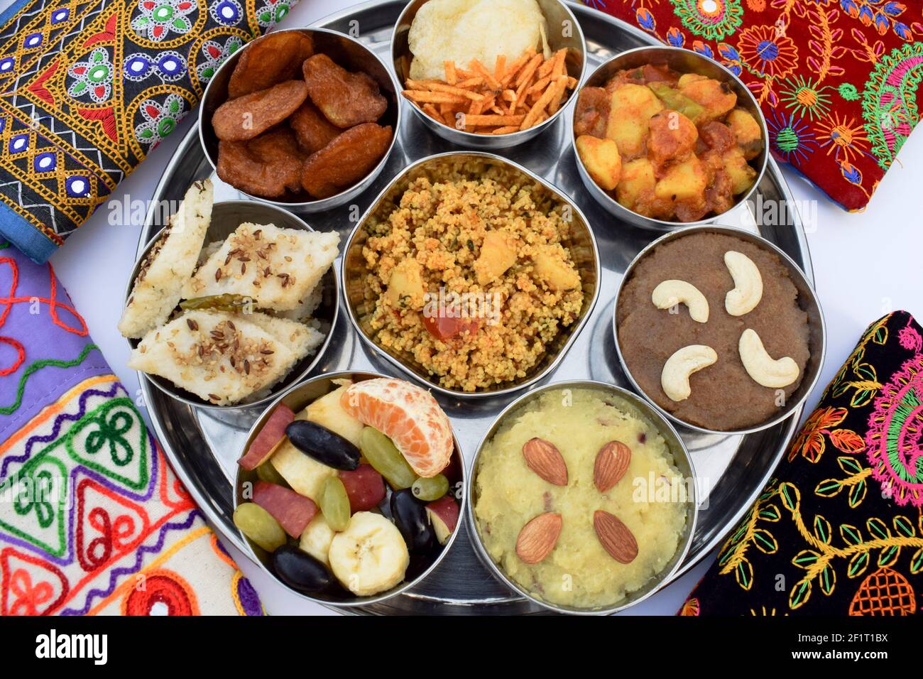 Farali vrat thaali homemade items Rajgira sheera, paratha, puri bhajiya ...