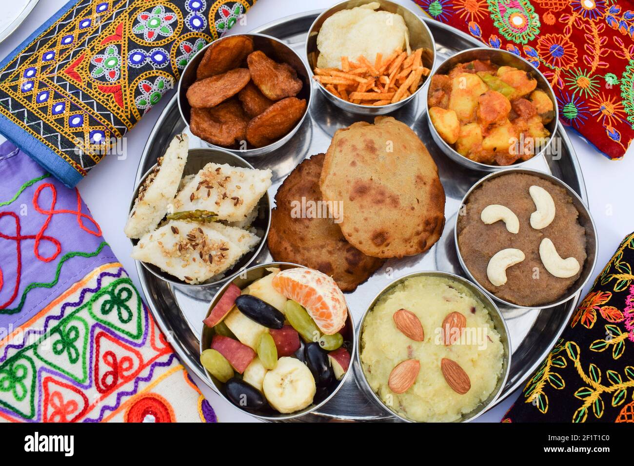 Farali vrat thaali homemade items Rajgira sheera, paratha, puri bhajiya ...