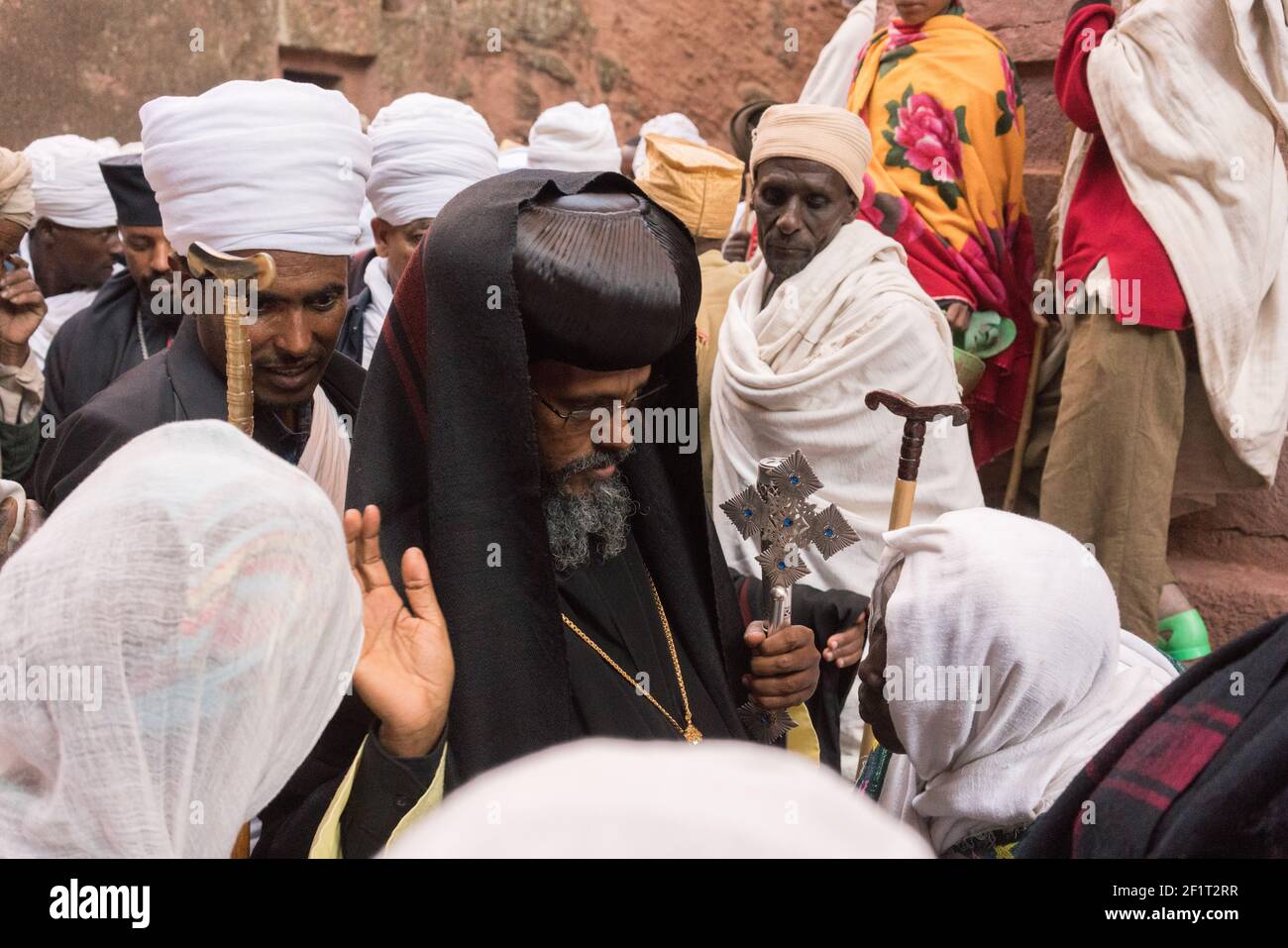 Priest and Pilgrims at a service at St. Emmanuel Church during Gena ...