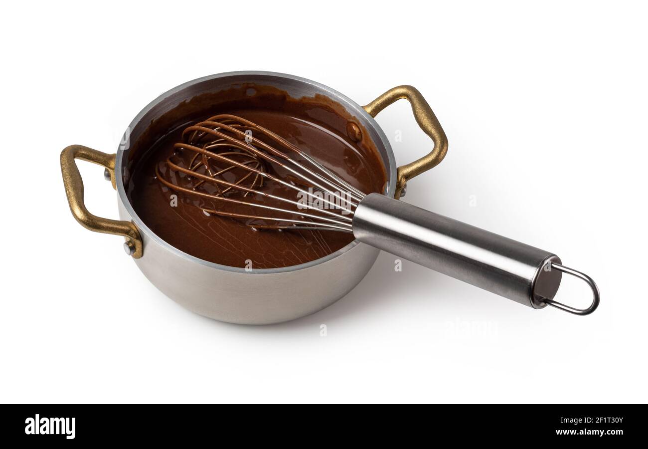 Ladle with liquid chocolate Stock Photo - Alamy