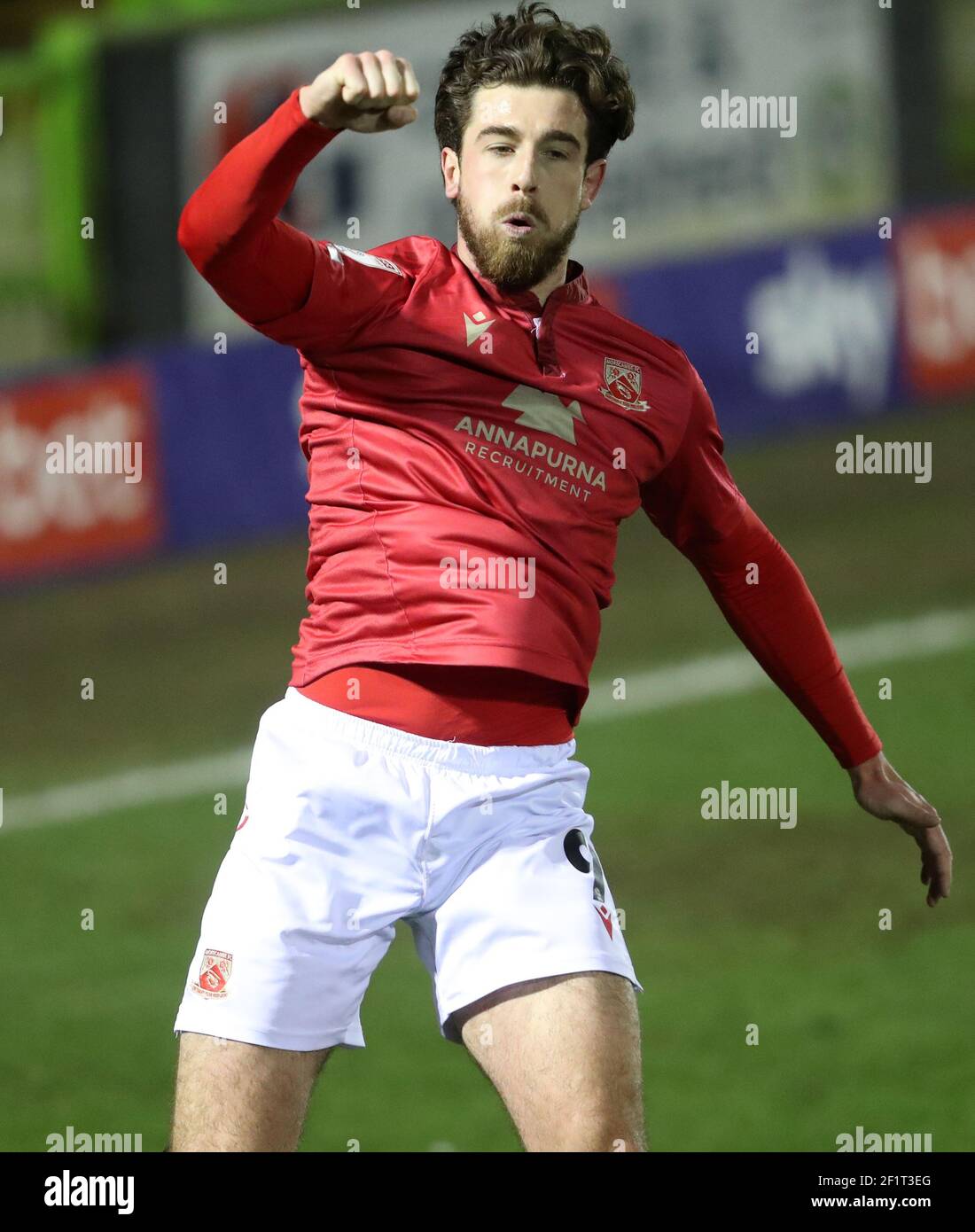 Morecambe's Cole Stockton celebrates scoring their side's first goal of ...
