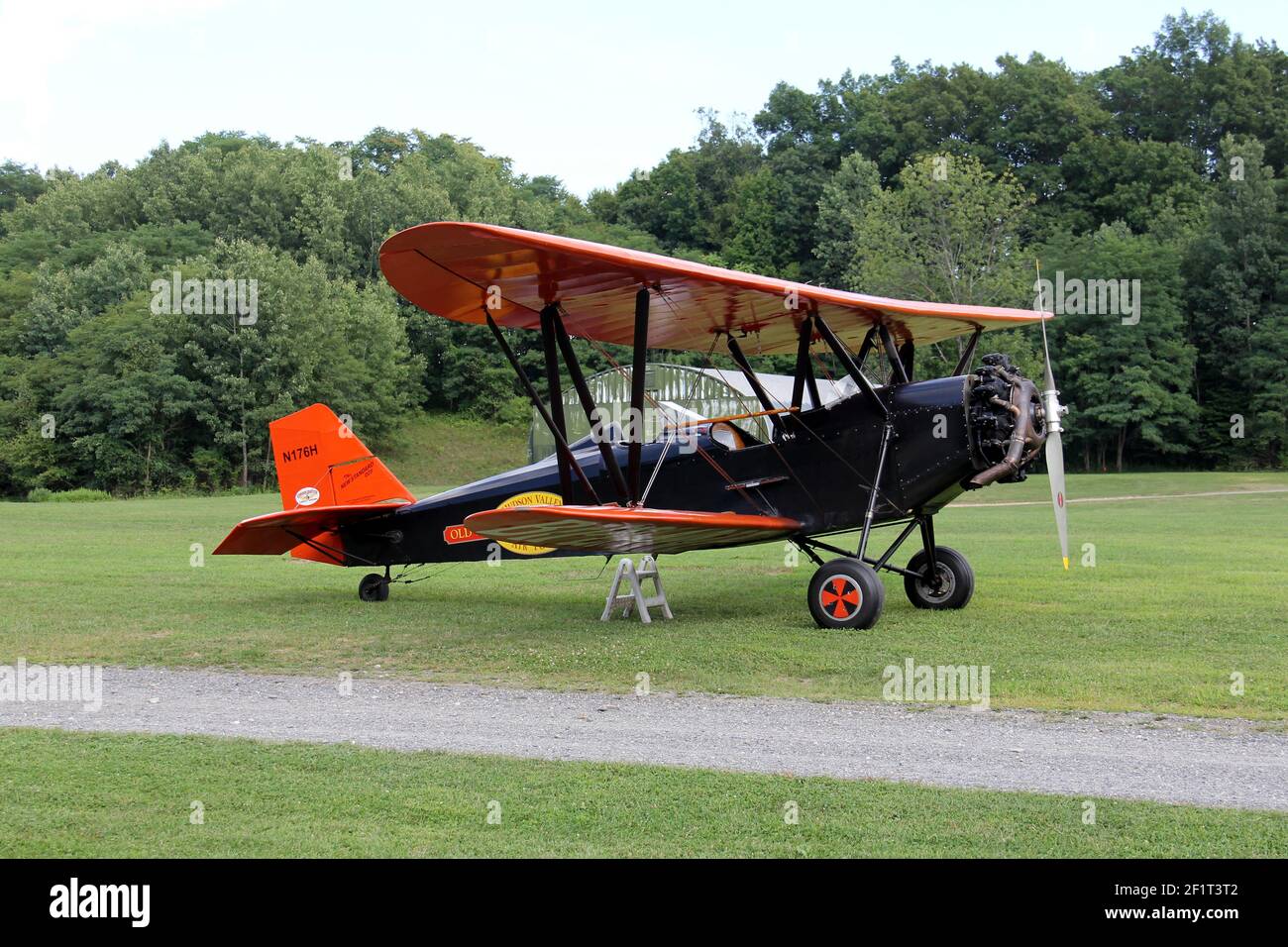 Vintage black and red airplane at the Old Rhinebeck Aerodrome, living ...