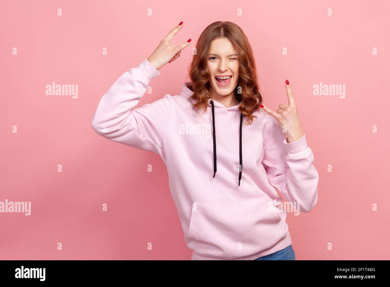 Excited female music fan hi-res stock photography and images - Alamy