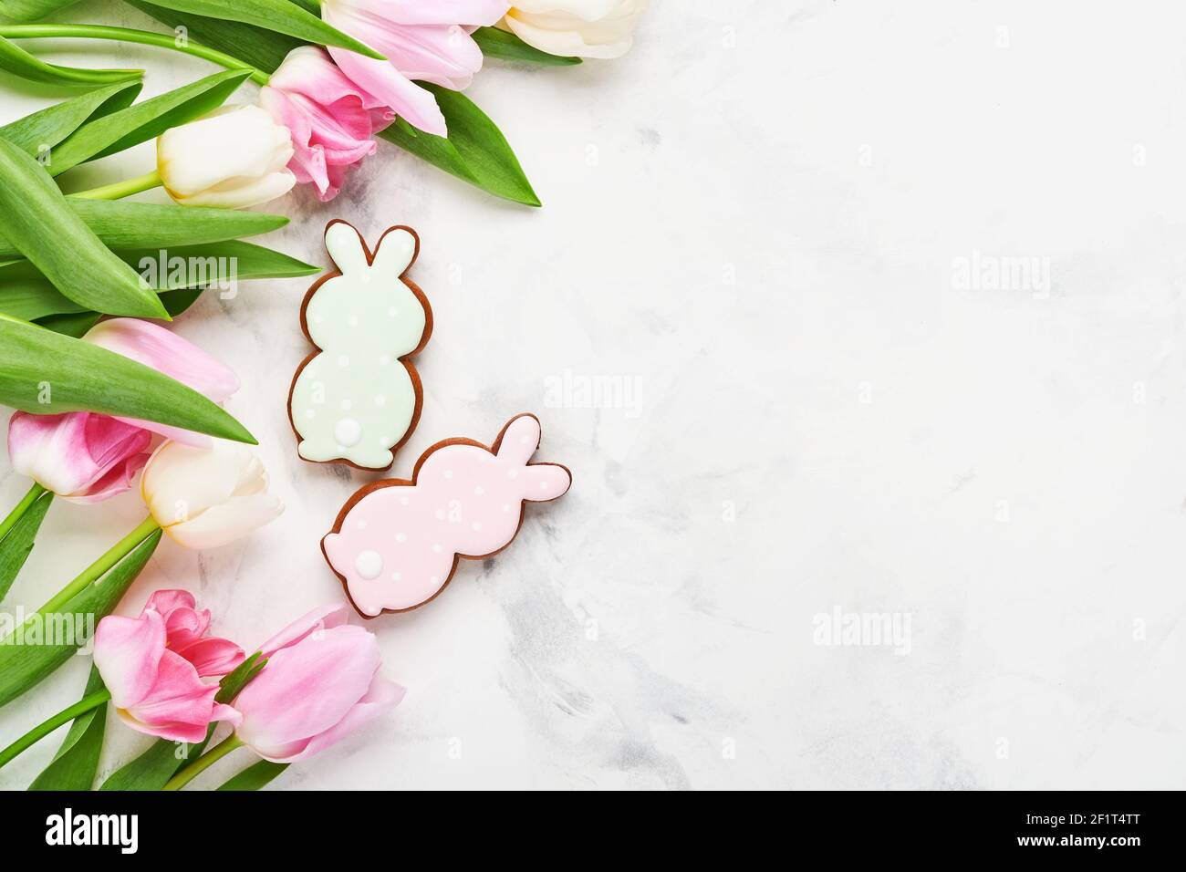 Easter table setting with floral decor and plate with easter ...