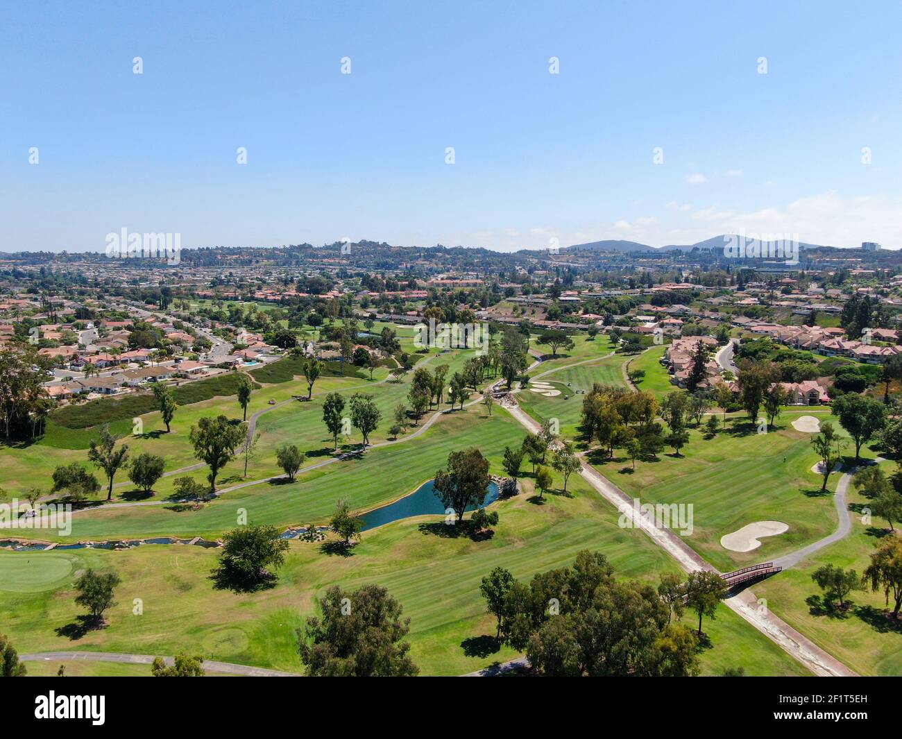 Aerial view of golf in upscale residential neighborhood Stock Photo - Alamy