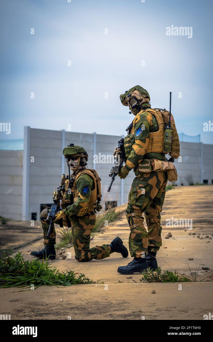 A closeup of two special forces soldiers on a military training Stock ...